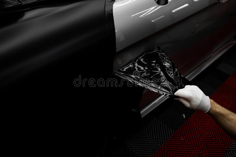 Car Wrap Application Changes Vehicle Appearance. Full Panel Car Vinyl ...