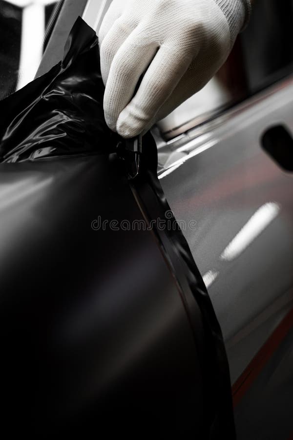 Car Wrap Application Changes Vehicle Appearance. Full Panel Car Vinyl ...