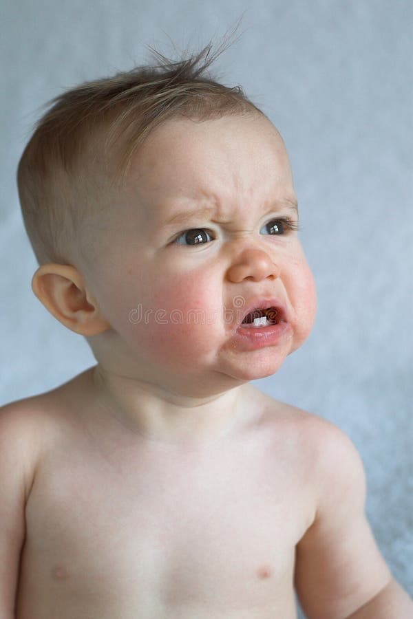Cara irritable foto de archivo. Imagen de bebé, poco, piel - 2010650