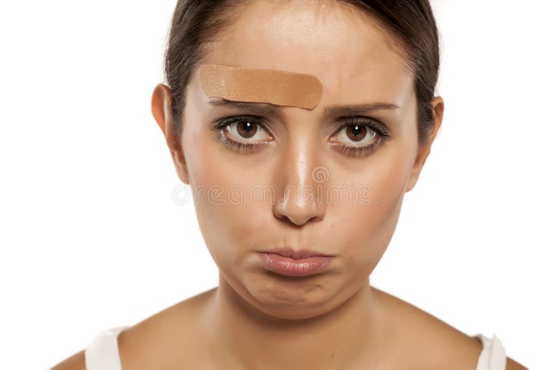 Cara lastimada imagen de archivo. Imagen de infeliz, pegamento - 84604345