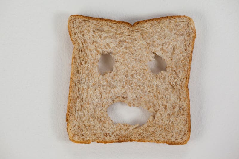 Cara Sonriente En Rebanada Del Pan Imagen de archivo - Imagen de tiro ...