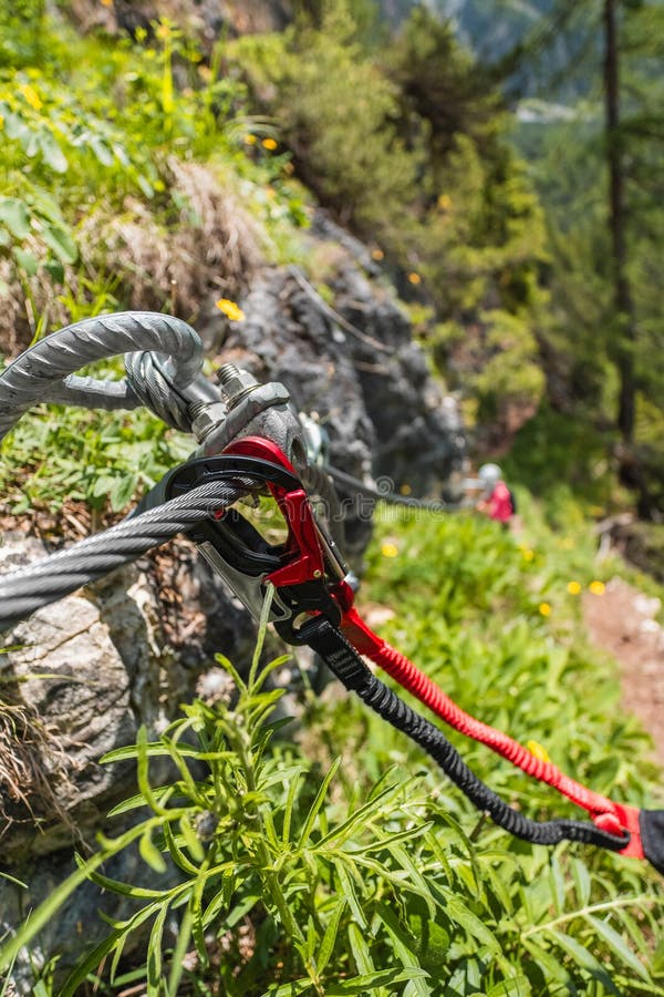 Carabiner Mounted on a Fixed Steel Cable Along a Climbing Path of a Via ...