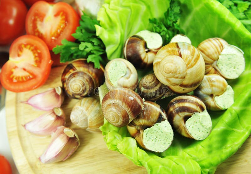 1,609 Caracoles En Salsa Fotos de stock - Fotos libres de regalías de ...