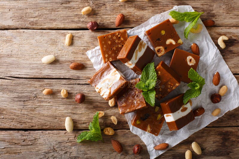 Caramel Candy with Nuts Close-up on the Table. Horizontal Top Vi Stock ...