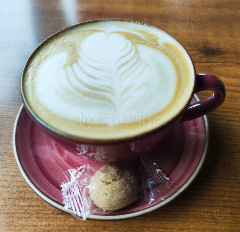 Caramel Cappuccino with Candy in the Cafe Stock Photo - Image of ...