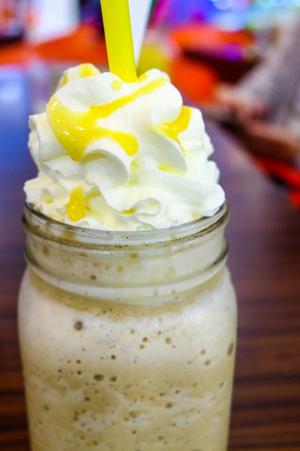 Caramel latte frappe stock image. Image of foam, frozen - 91001589