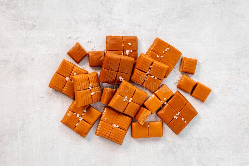 Caramel Pieces of Caramel Candies with Sea Salt, Top View Stock Photo ...