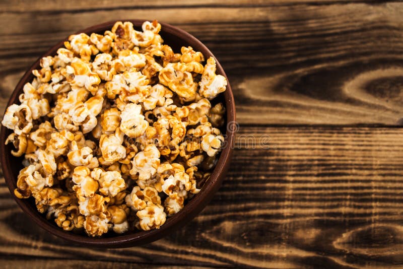 Caramel Popcorn in Clay Bowl Stock Photo - Image of close, macro: 90031734