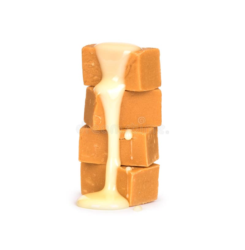 Caramel pouring on candies stock photo. Image of isolates - 71403726