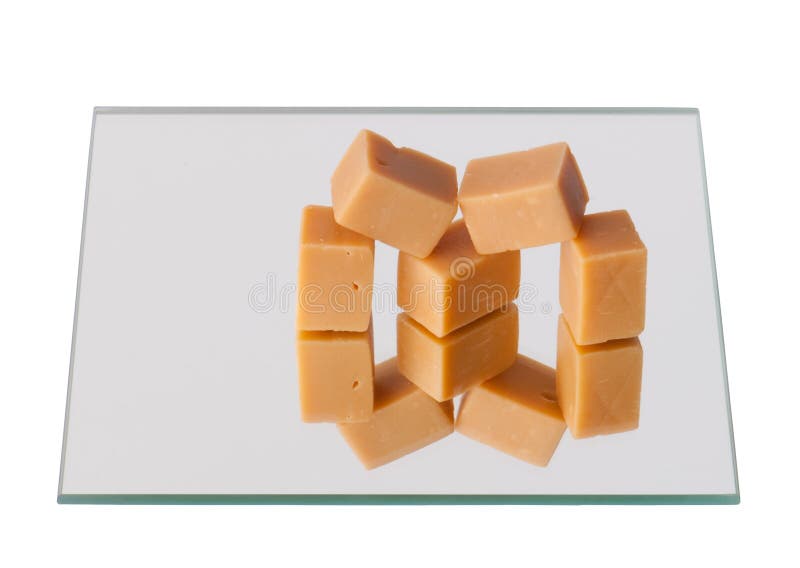 Caramel Sweets on a Mirror, Isolated Stock Photo - Image of pile, candy ...