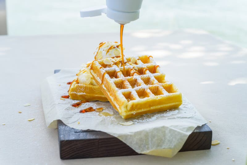 Caramel Syrup Put on Belgian Waffles Stock Photo - Image of bakery ...