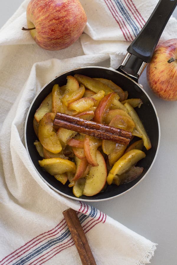 Caramelized apples in pan stock image. Image of close - 99881651