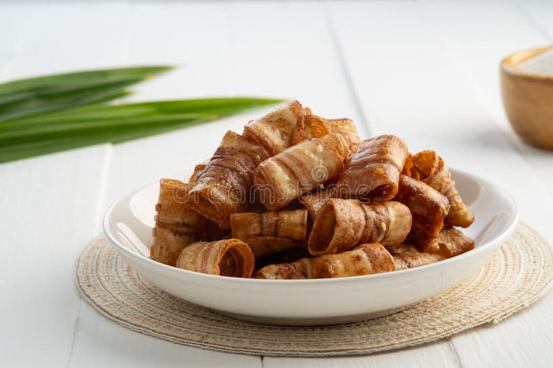 Caramelized Banana Roll,Crispy Banana Chip Rolls in White Plate. Stock ...