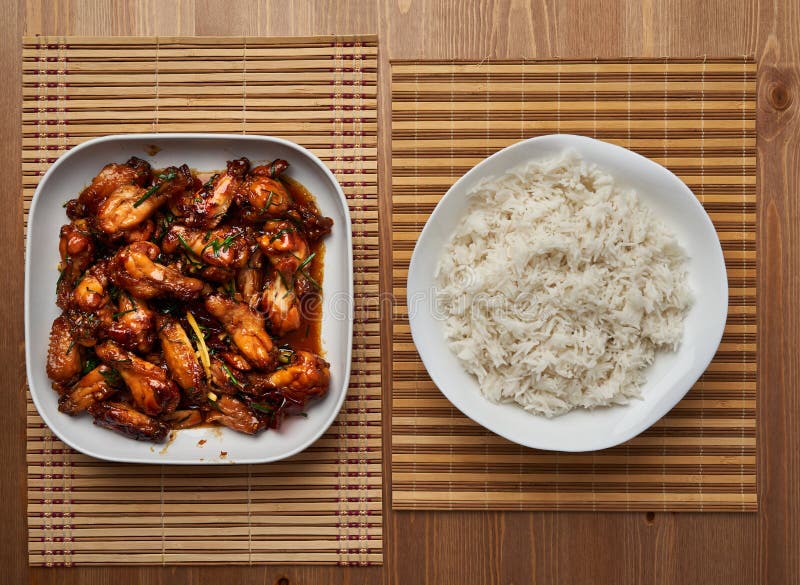 Caramelized Chicken Wings and Rice Stock Photo - Image of caramelized ...