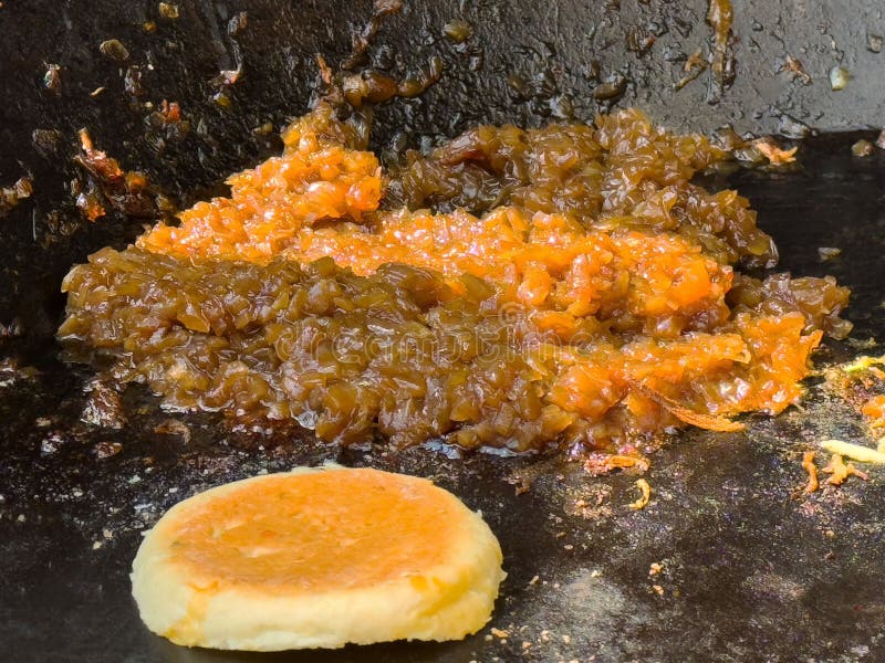 Caramelized Onion and Potato Cake on Griddle with Golden Crust Stock ...