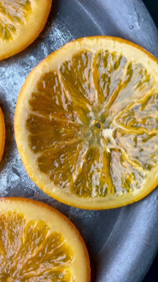 Caramelized Orange Slices Cooling on Flat Surface – Vertical Video ...