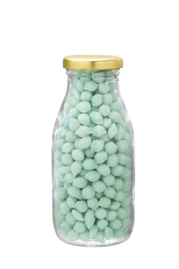 Caramelo En Una Botella Aislada En El Fondo Blanco Foto de archivo ...