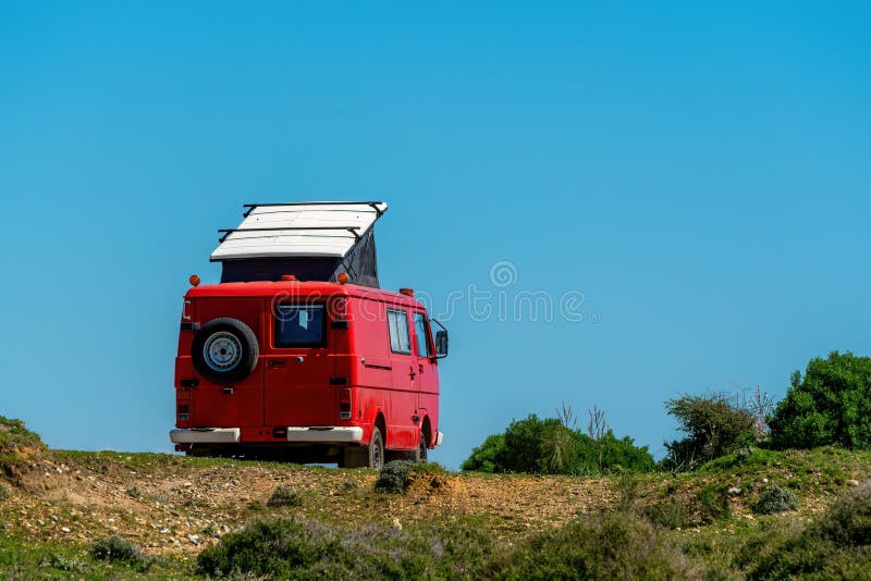 A Caravan Used for Camping in Nature. Red Caravan Stock Photo - Image ...