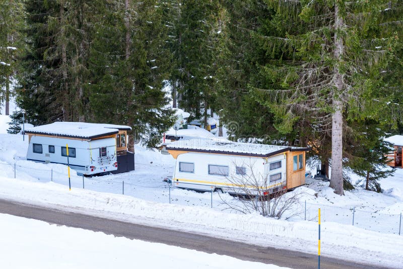 Caravans and Campers in a Snow Covered Alpine Campsite in Winter Stock ...