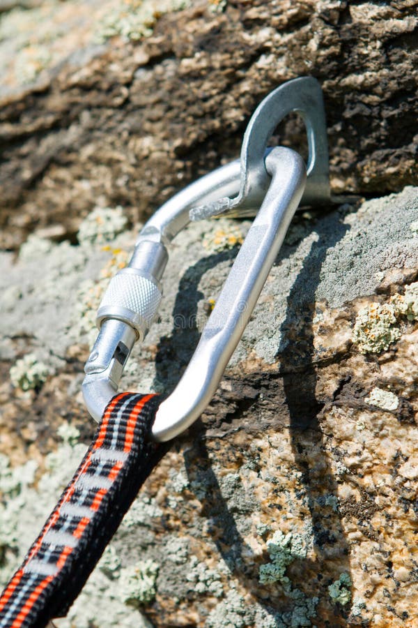 Carbine and Hook with Rope in Stone Stock Image - Image of rope ...