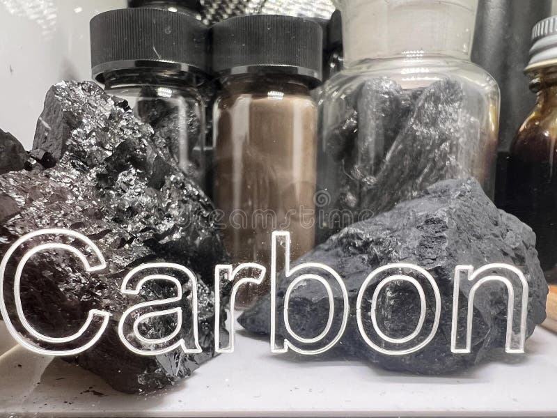 Carbon Sign in Front of Natural Deposits of Graphite Stock Photo ...