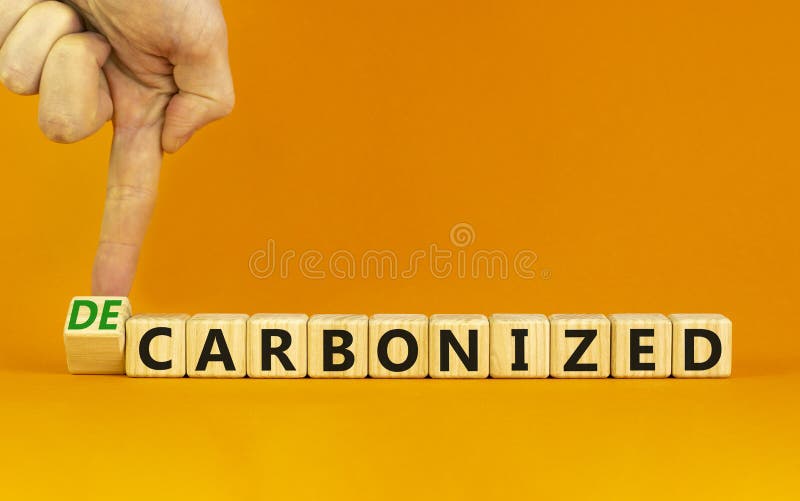 Carbonized or Decarbonized Symbol. Businessman Turns a Wooden Cube and ...