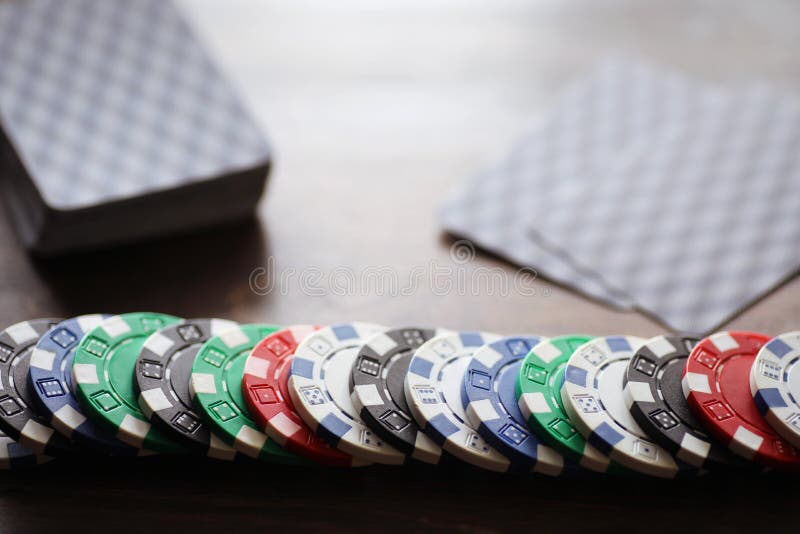 Card Game Using Chips on a Wooden Table Stock Image - Image of ...
