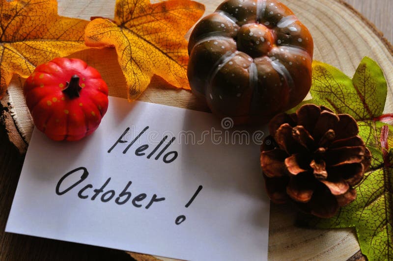 Card with Hello October Write between Leaves and Pumpkins Stock Photo ...