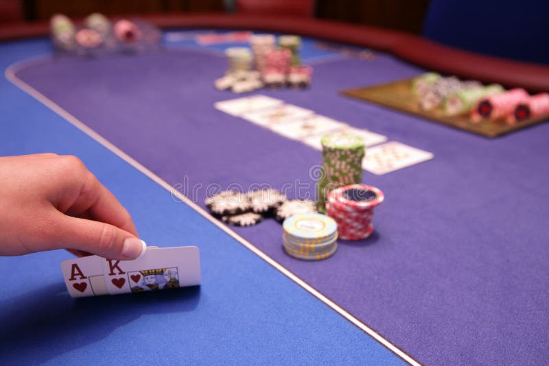 Card player checks hand stock image. Image of contemporary - 111737999