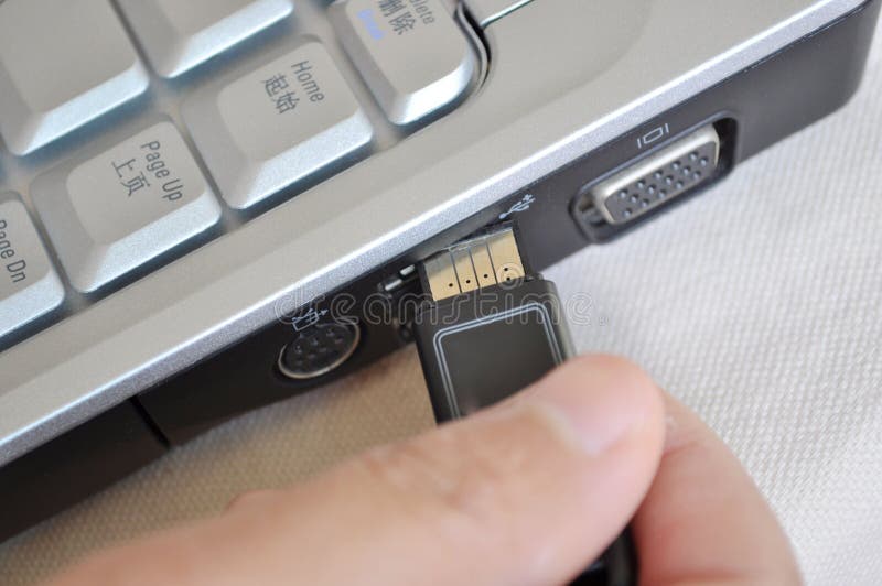 Plugging in the USB Cable stock photo. Image of digital - 22805118