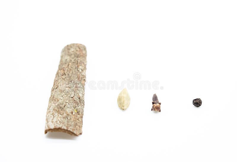 Cardamom, Cinnamon Sticks, Black Pepper Peas and Cloves on White Stock ...