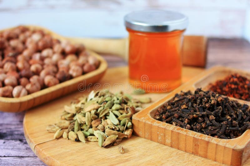 Cardamom Grains, Cloves and Nuts Stock Photo - Image of grains, closeup ...