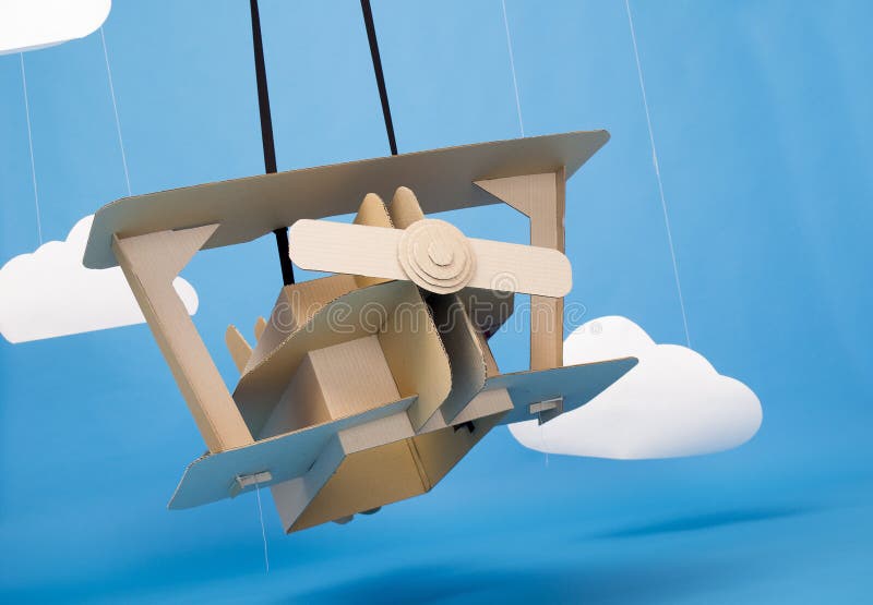 Cardboard airplane stock image. Image of hand, cardboard - 58953795