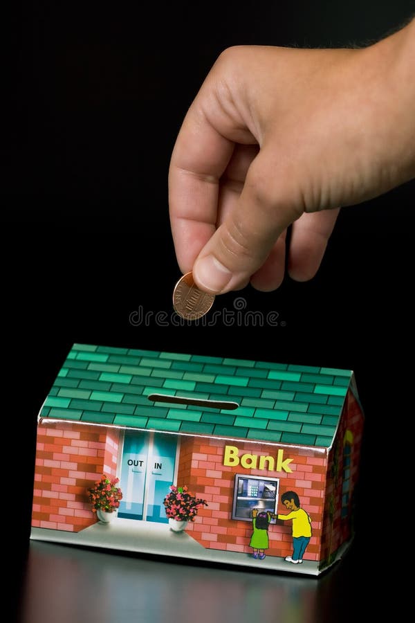 Cardboard Bank Box And Penny Picture. Image: 5584484