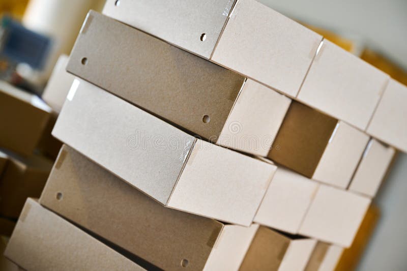 Cardboard Blanks Ready for Assembly in a Bustling Box Manufacturing ...