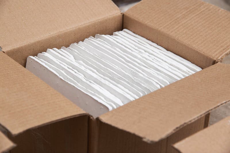 Cardboard Box with a Decorative Stone Made of Plaster in the Form of a ...