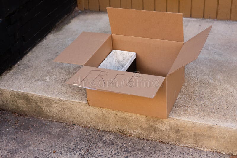 Cardboard Box with a Free Sign on the Sidewalk Displaying an Empty ...