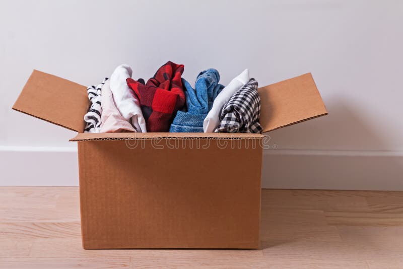 Colorful Clothing In A Wardrobe Box For Moving Stock Image - Image of ...