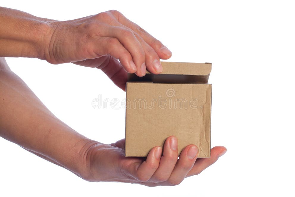 Cardboard box in hand. stock photo. Image of carton, open - 27738638