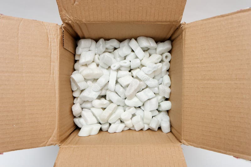 A Cardboard Box with Packing Foam Pellets Stock Photo - Image of cross ...