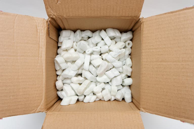 A Cardboard Box with Packing Foam Pellets Stock Photo - Image of cross ...