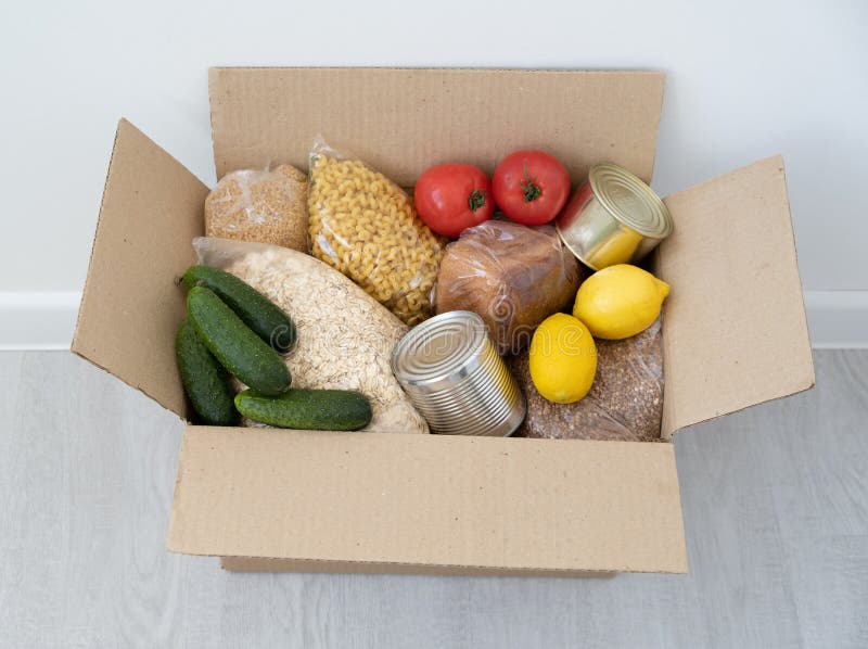 Cardboard Box with a Set of Food Items. Delivery Concept Stock Photo ...