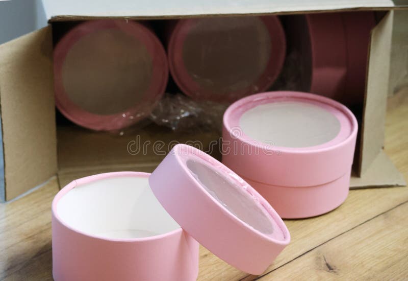 A Cardboard Box with a Set of Pink Gift Boxes. Small Boxes with Windows ...