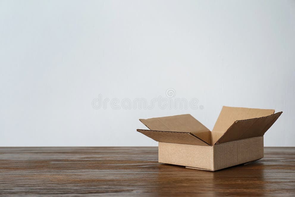 Cardboard box on table stock image. Image of moving - 114337669