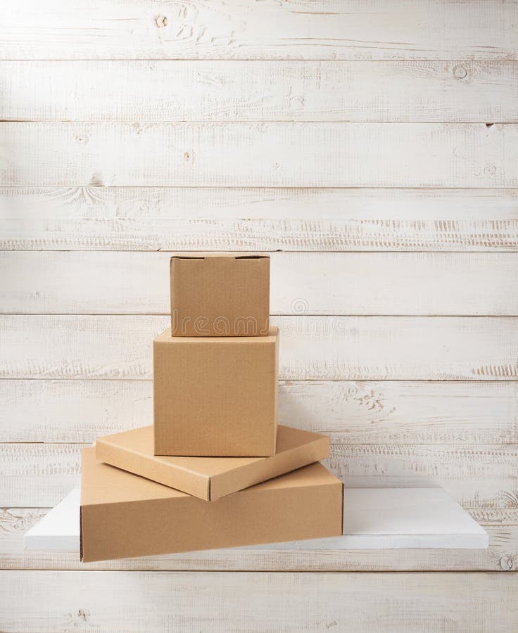 Cardboard Box on Wooden Shelf Stock Photo - Image of baggage, plaster ...