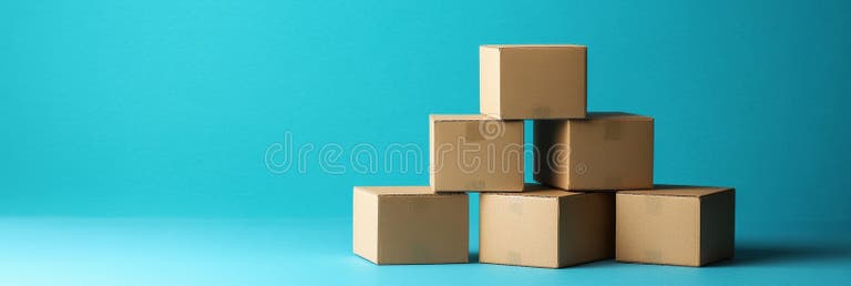 Cardboard Boxes from Amazon are Stacked in Front of a Light Blue ...