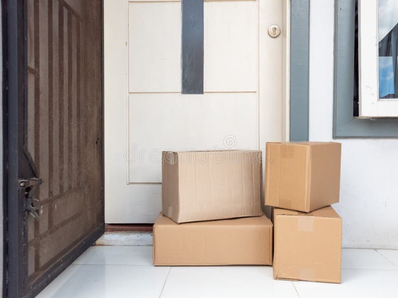 Cardboard Boxes Delivered at the Front Door Ready for Unpacking Stock ...