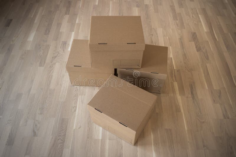 Cardboard Boxes on the Floor Stock Photo - Image of package, paper ...