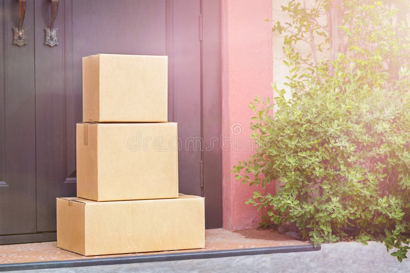 Cardboard Boxes are in Front of the Door Stock Photo - Image of fence ...