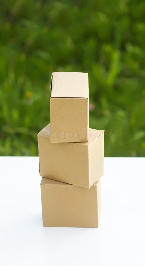 Cardboard Boxes on Green Grass Outdoors Stock Photo - Image of deliver ...